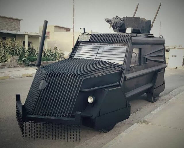 kurdish_troops_prepare_their_batmobile-style_armoured-car_for_mosuls ...